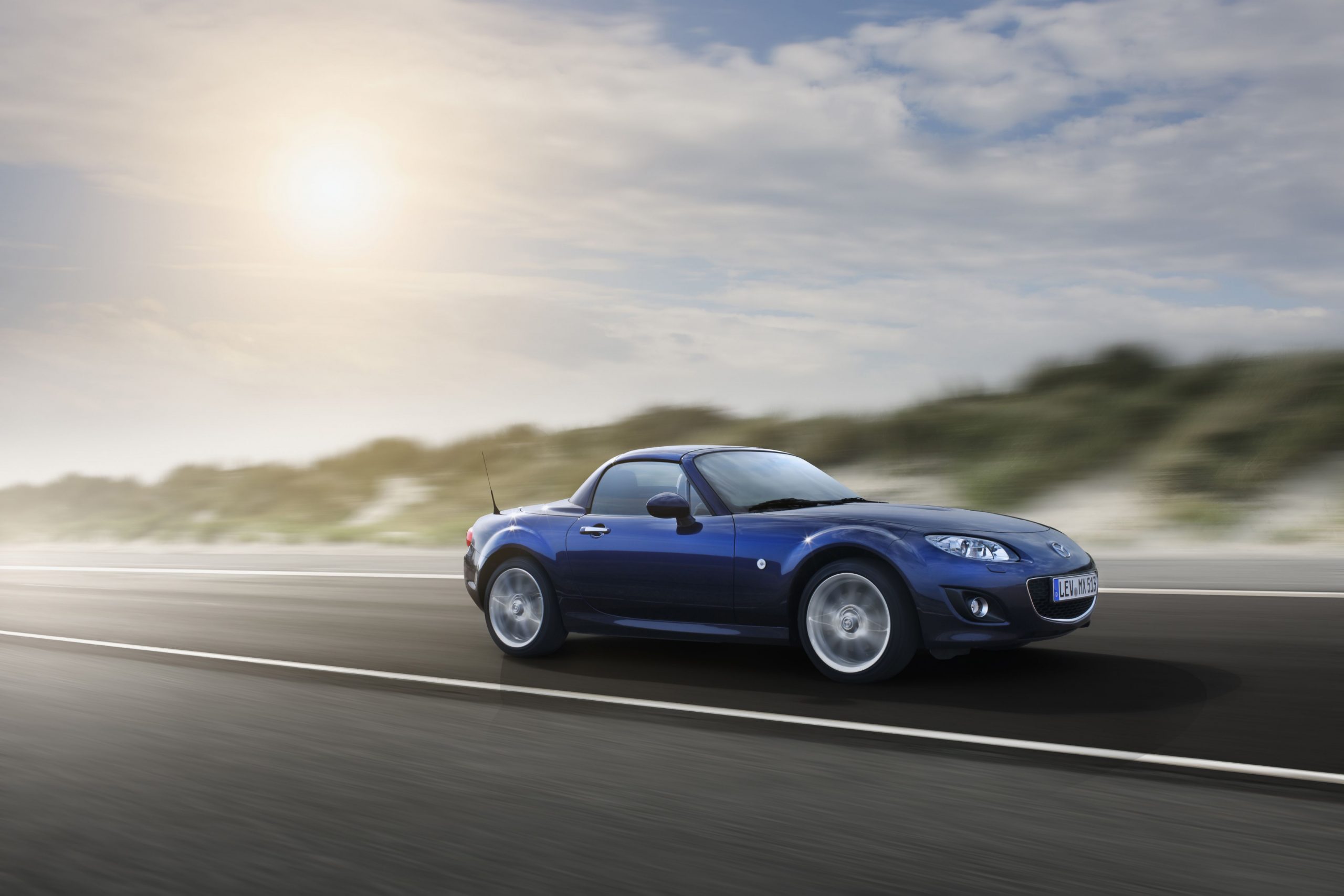 Pick your all-time favorite Mazda coupe from these factory photos ...