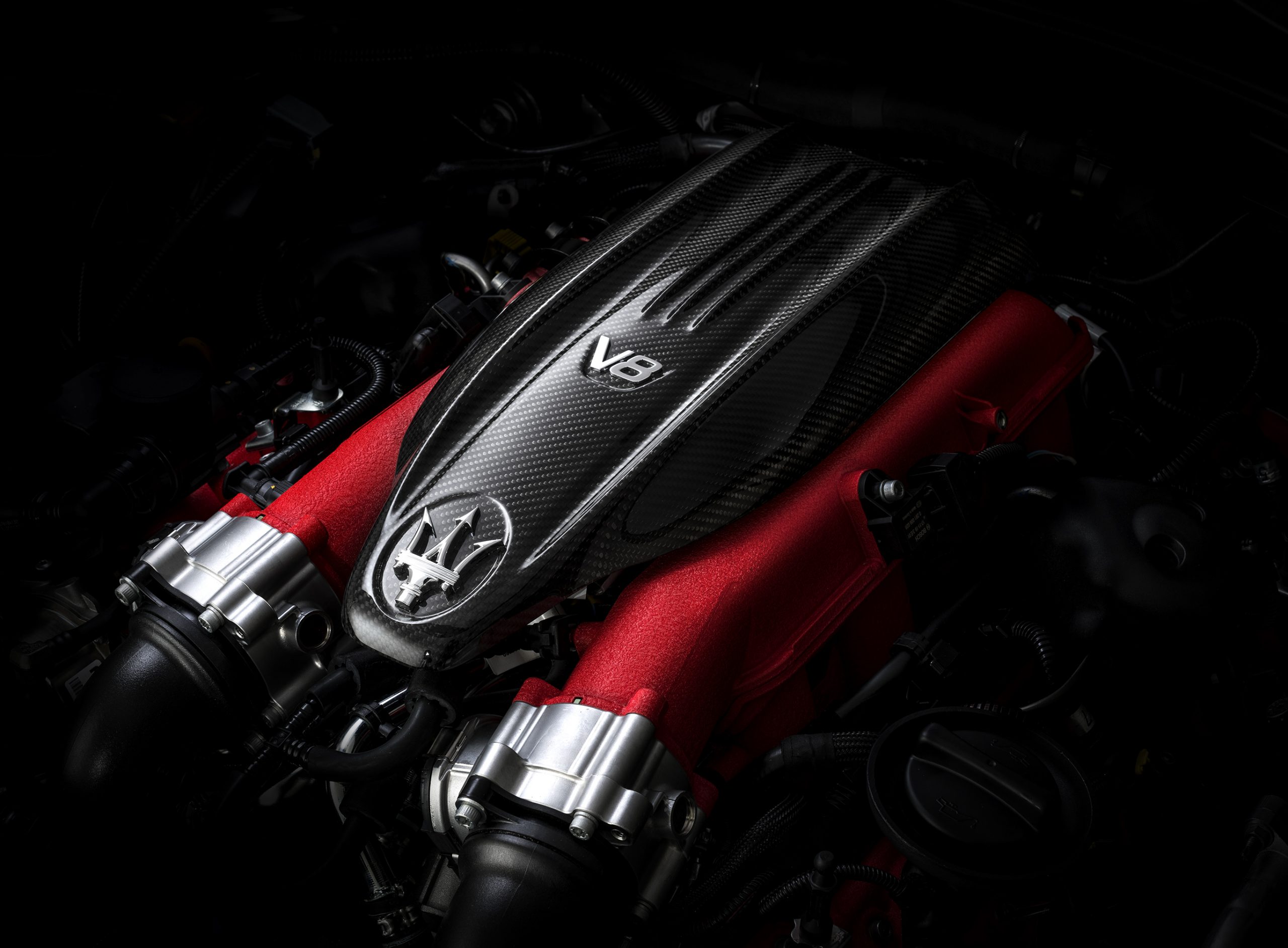 Maserati stuffs 580-hp Ferrari twin-turbo V-8 into Ghibli and ...