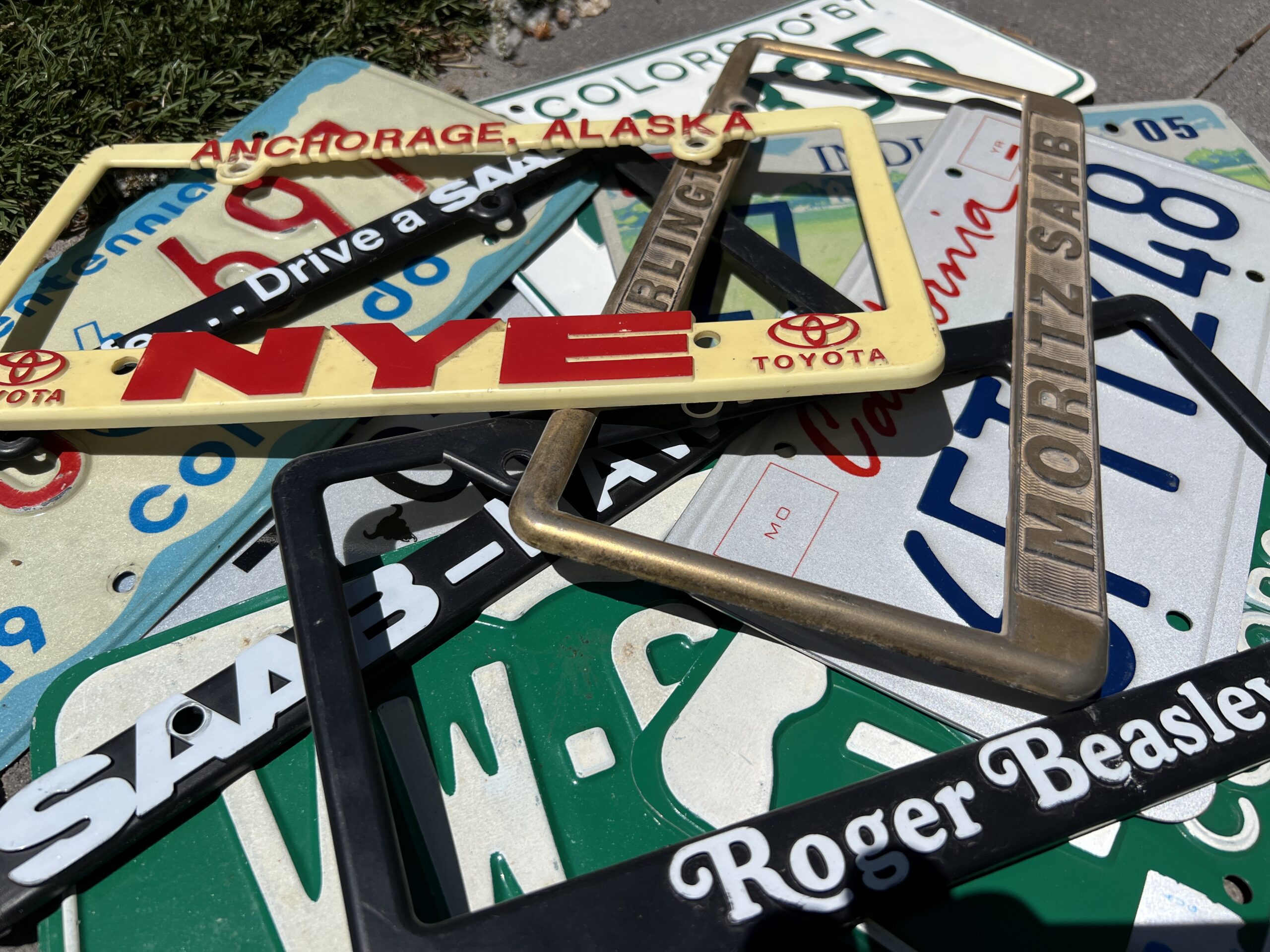 Vintage Dealership Badges and License Plate Frames Are the Ultimate ...